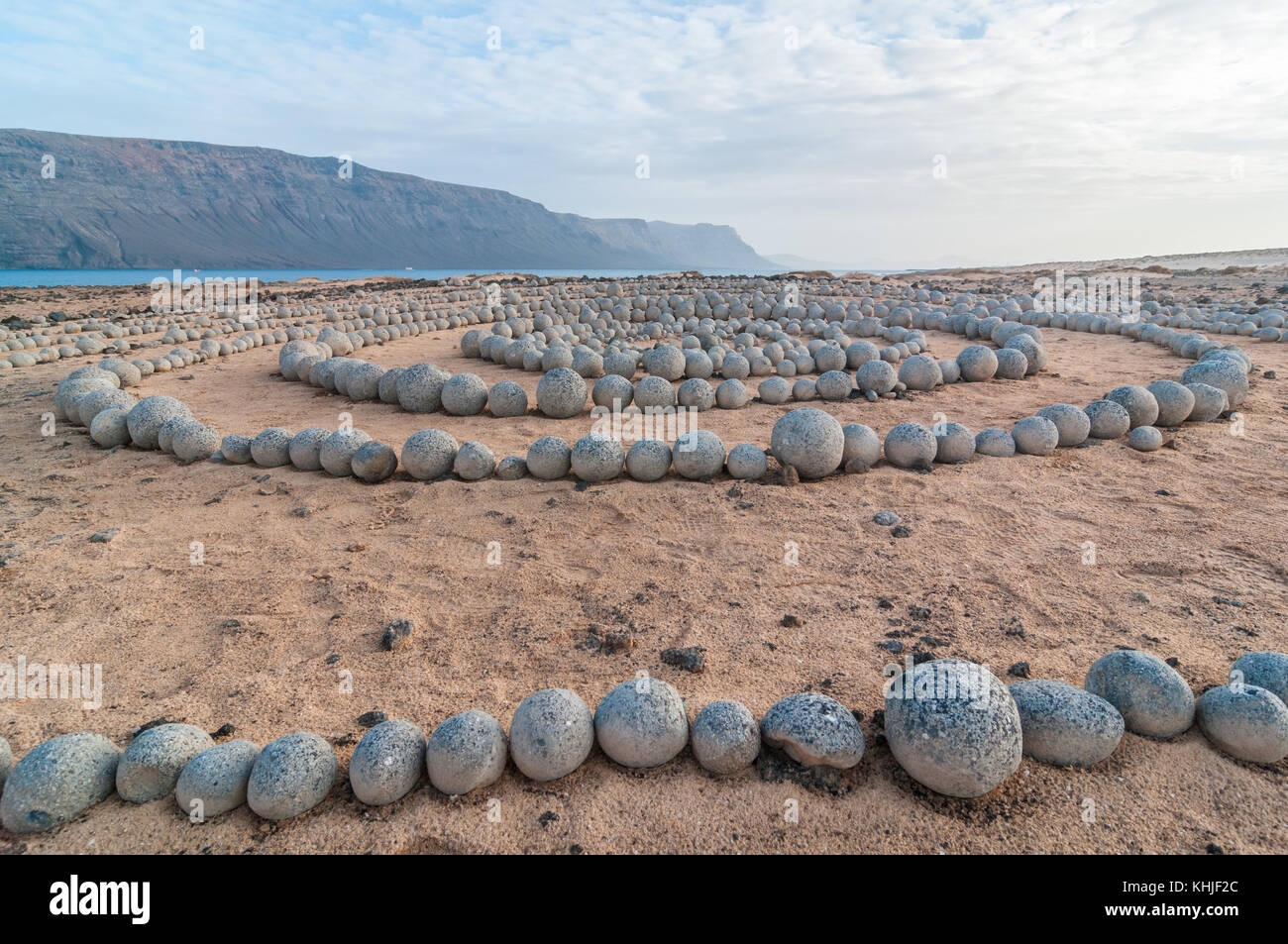 completely circular stones on the ground forming a spiral near the ...
