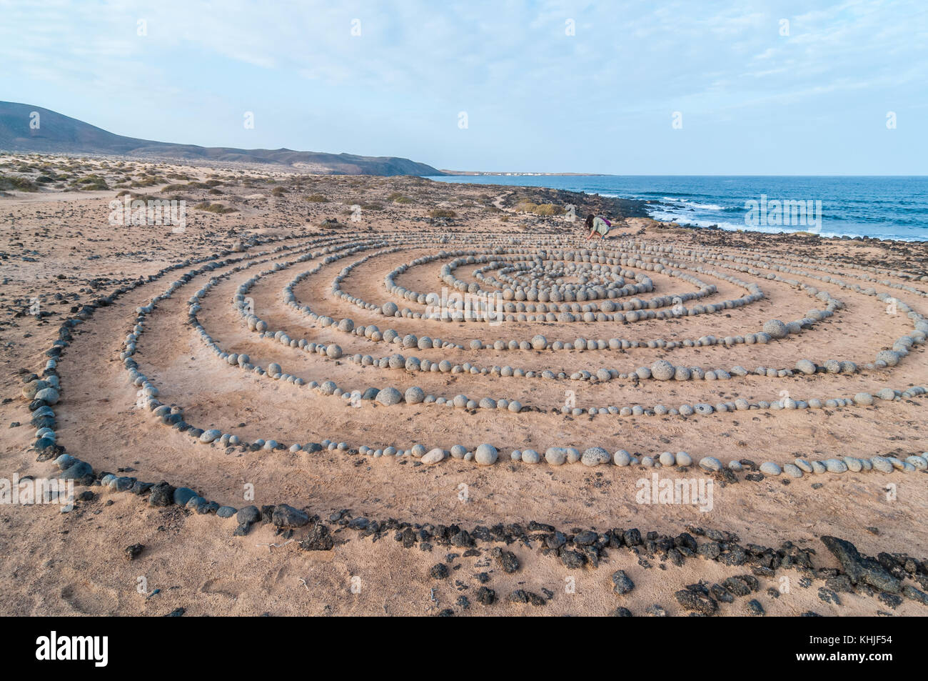 completely circular stones on the ground forming a spiral near the ...