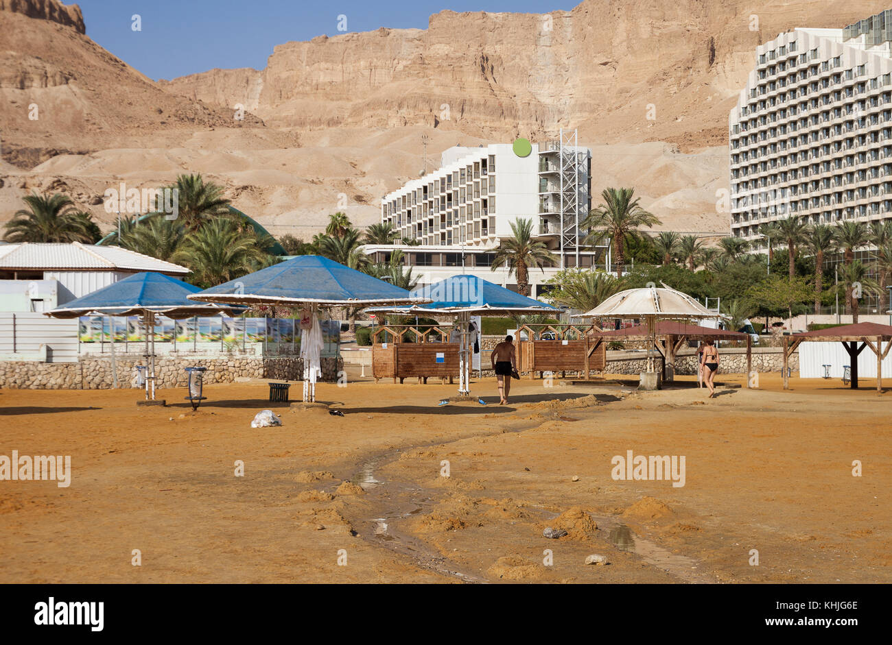 Man is washed in the shower on the beach of Dead sea, Israel Stock ...