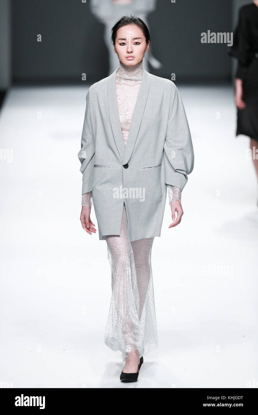 A model on the catwalk at the Anirac show during Shanghai Fashion Week ...