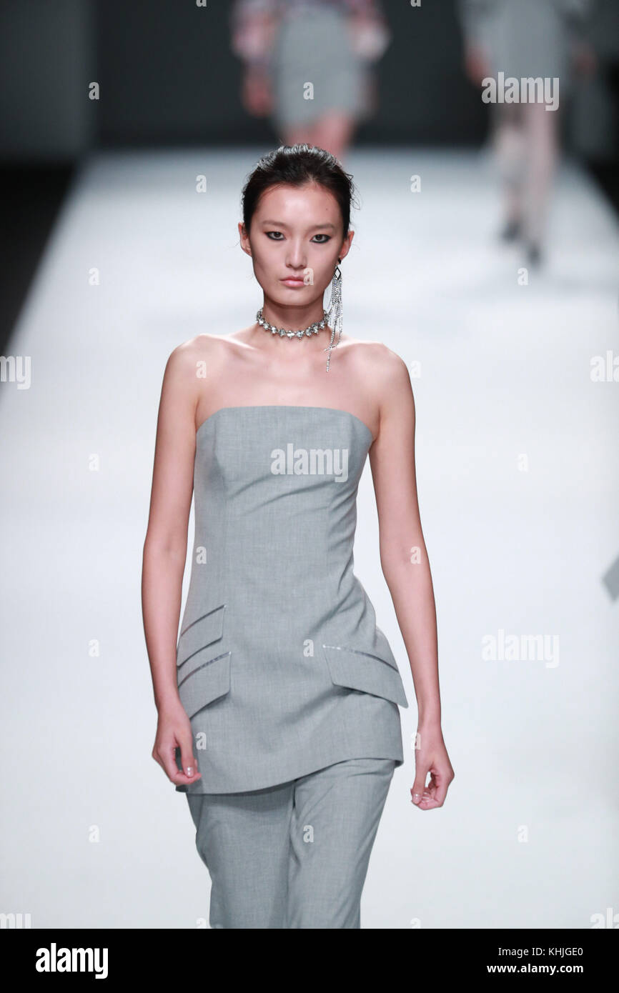 A model on the catwalk at the Anirac show during Shanghai Fashion Week ...