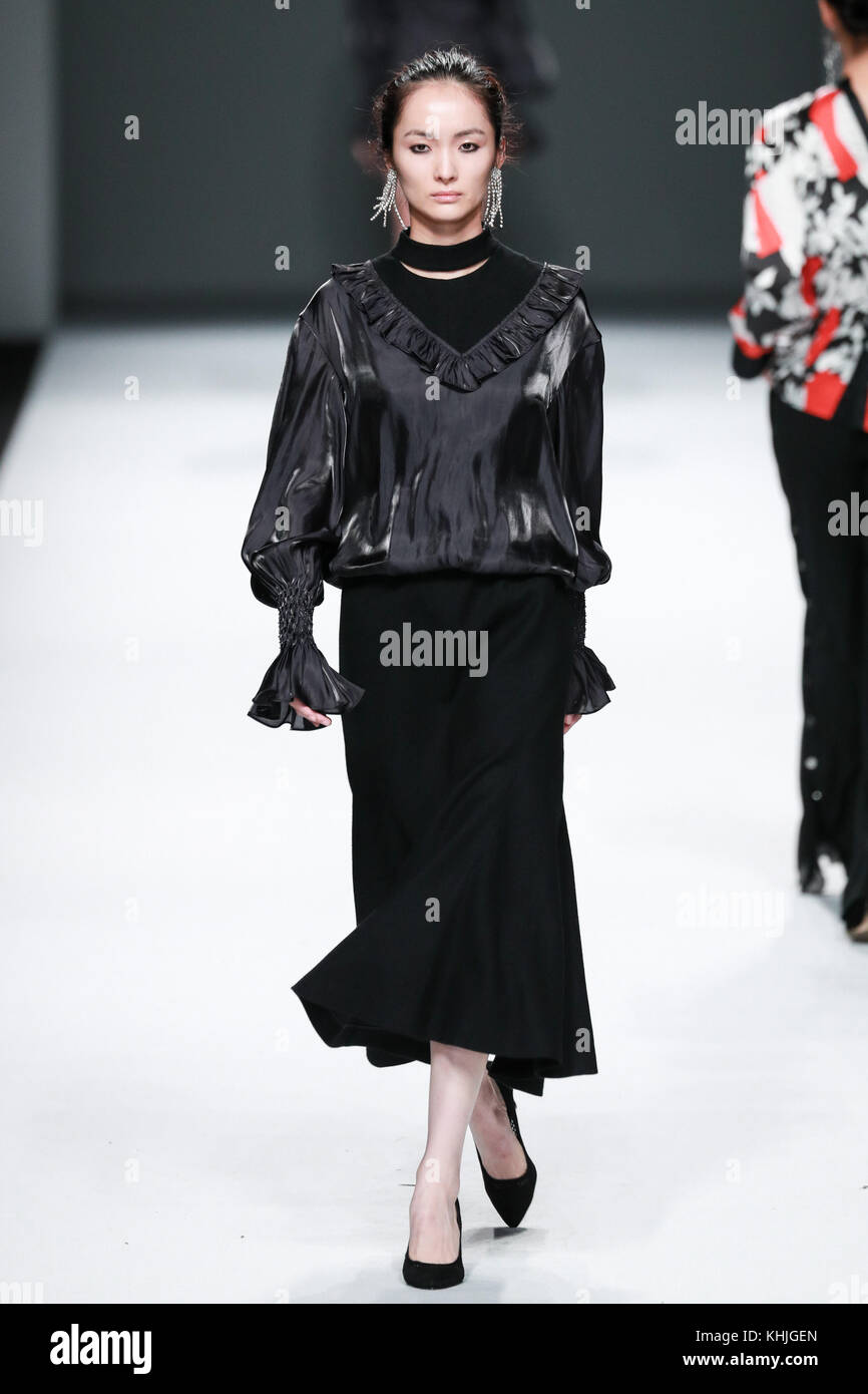 A model on the catwalk at the Anirac show during Shanghai Fashion Week Spring/Summer 2018 in ...