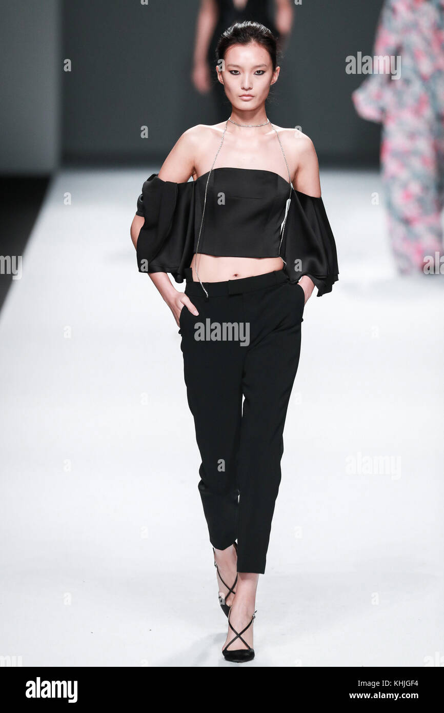 A model on the catwalk at the Anirac show during Shanghai Fashion Week ...