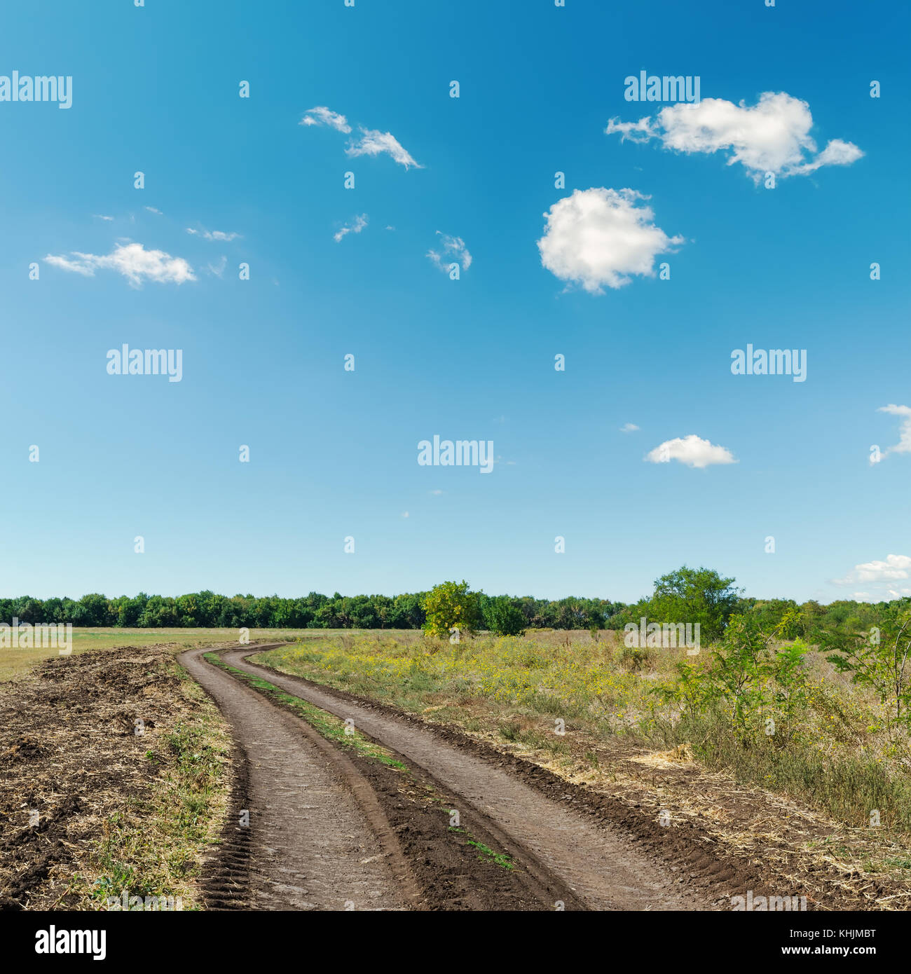 rural road and deep blue sky Stock Photo - Alamy