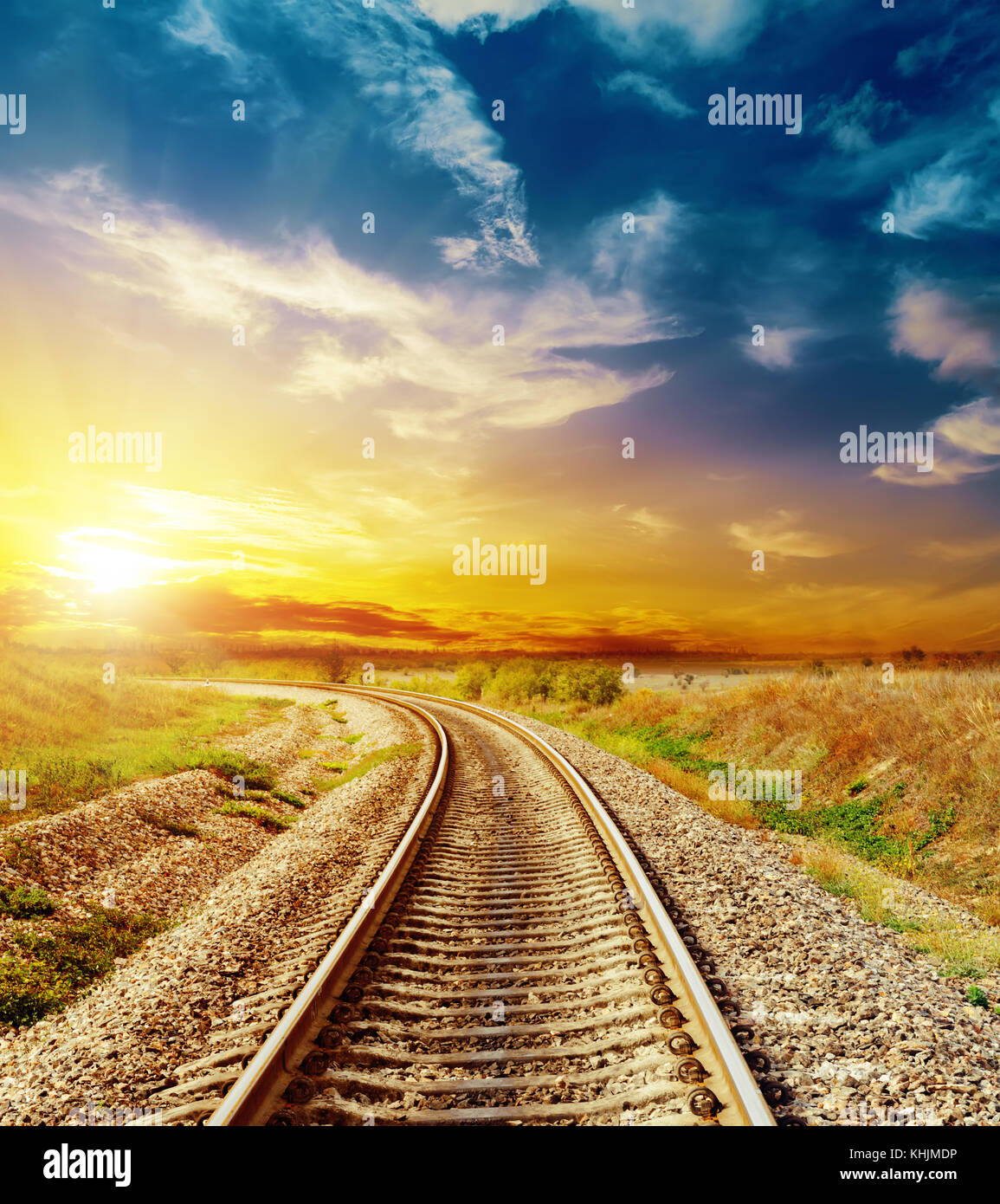 good sunset in colored sky over railroad Stock Photo - Alamy