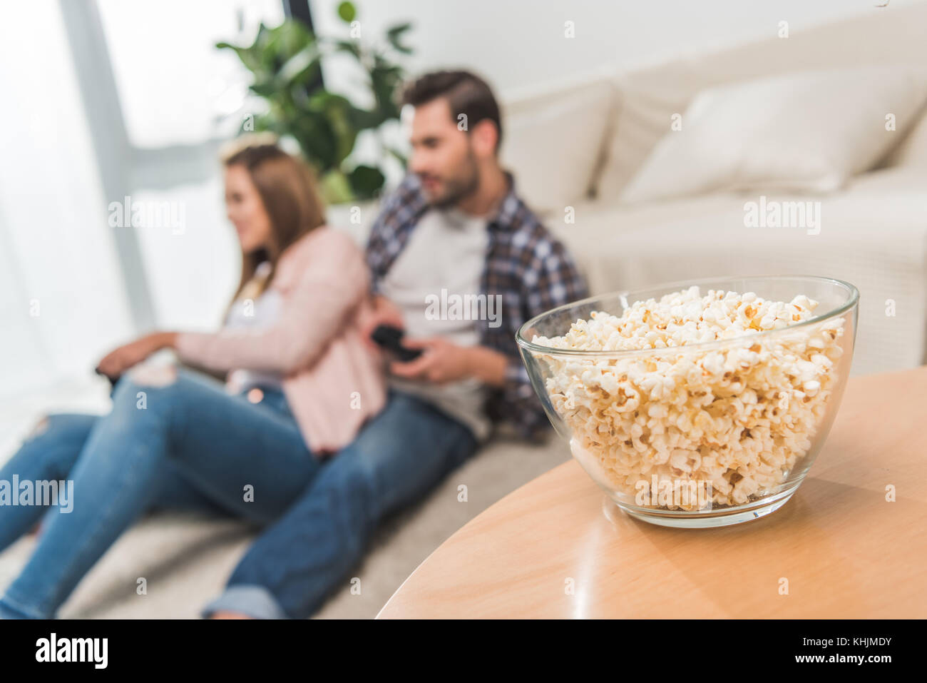 Bowl of popcorn in living room Stock Photo - Alamy