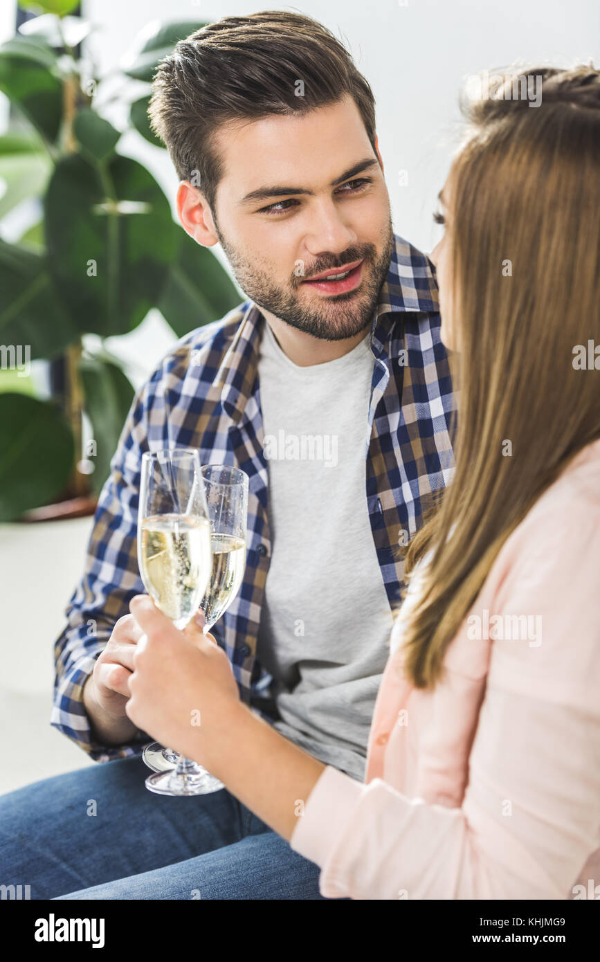 Affectionate couple drinking champagne hi-res stock photography and ...