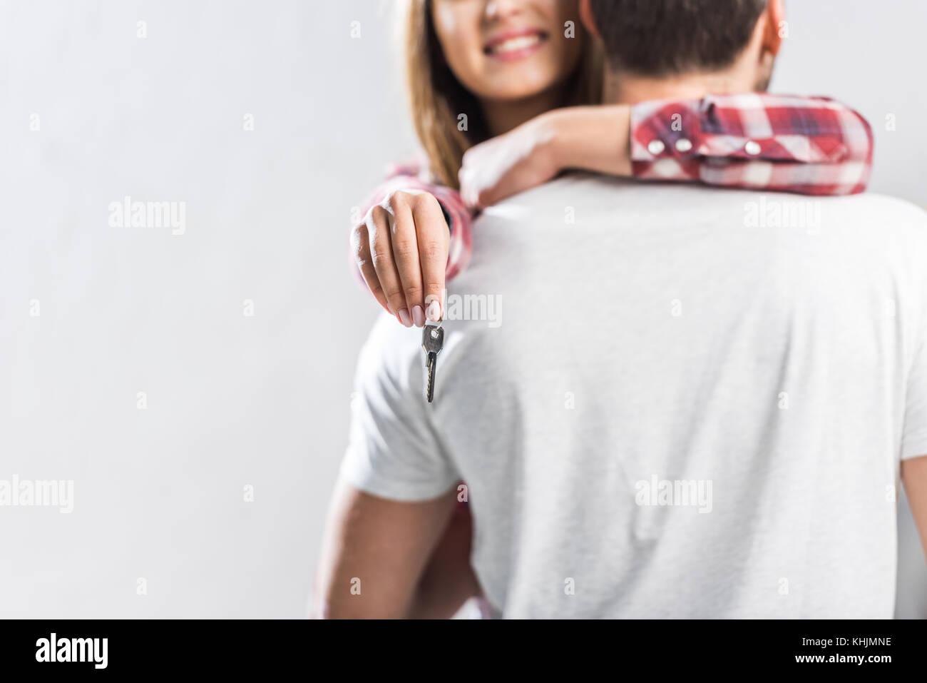 woman showing key Stock Photo - Alamy