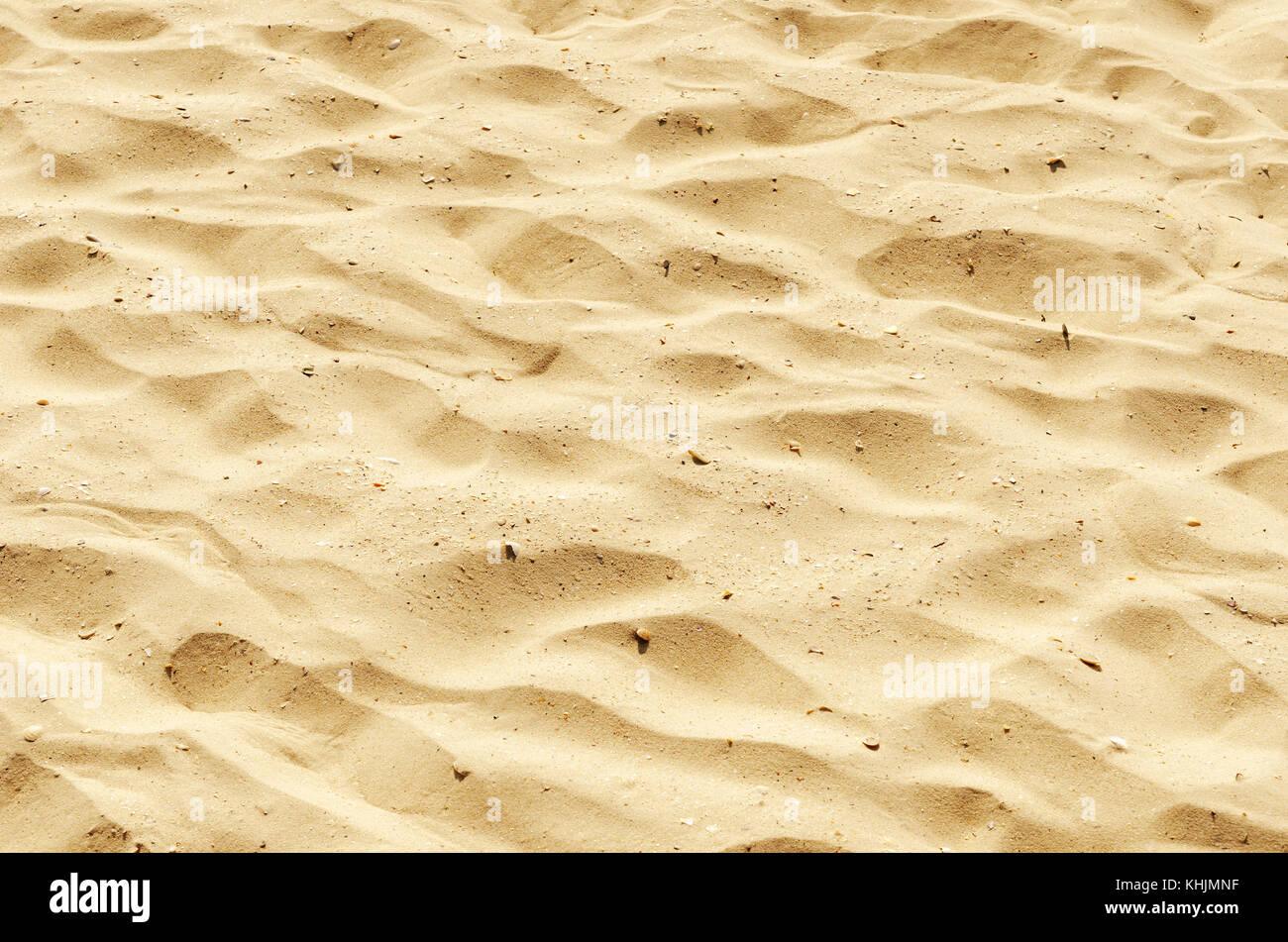 yellow sand as texture and background Stock Photo - Alamy