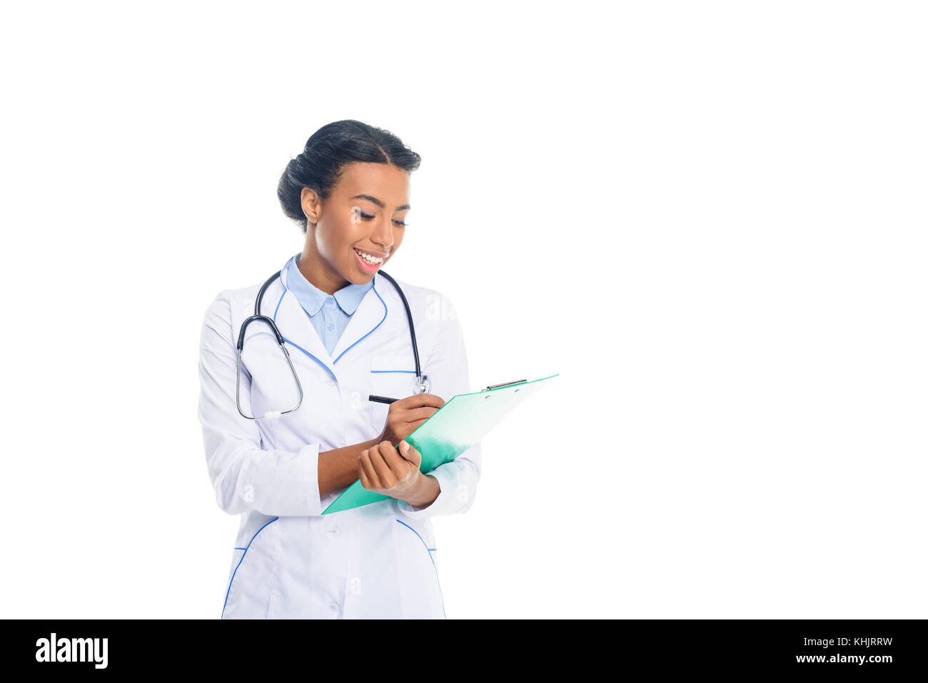 african american doctor writing diagnosis Stock Photo - Alamy