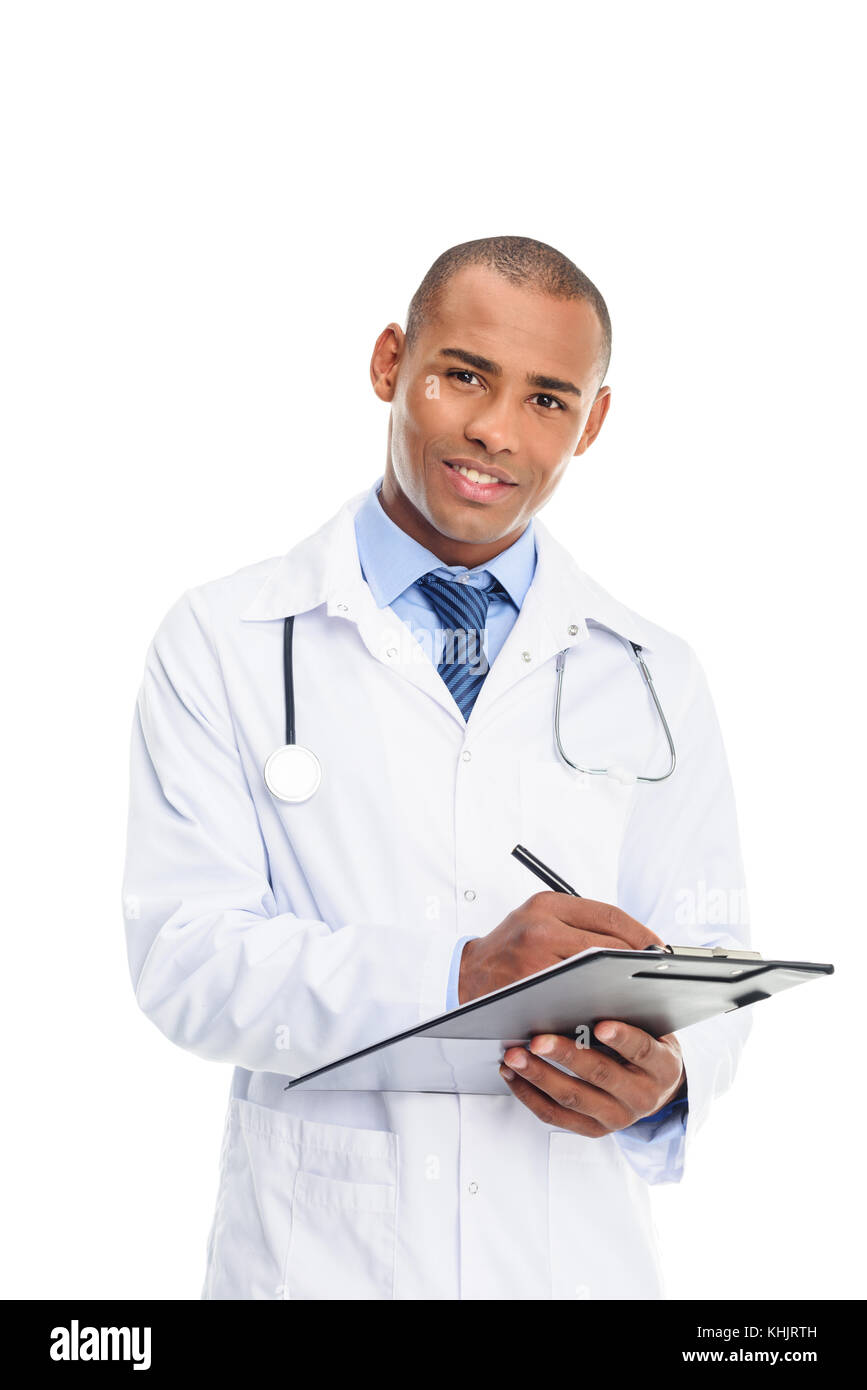 african american doctor writing diagnosis Stock Photo - Alamy