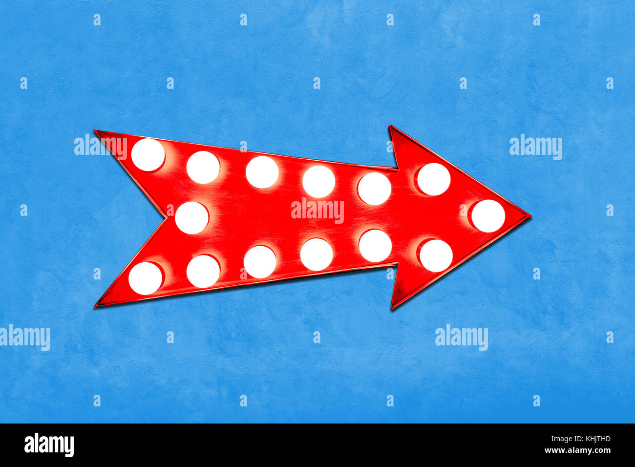 Red arrow shaped vintage colorful illuminated metallic display sign ...