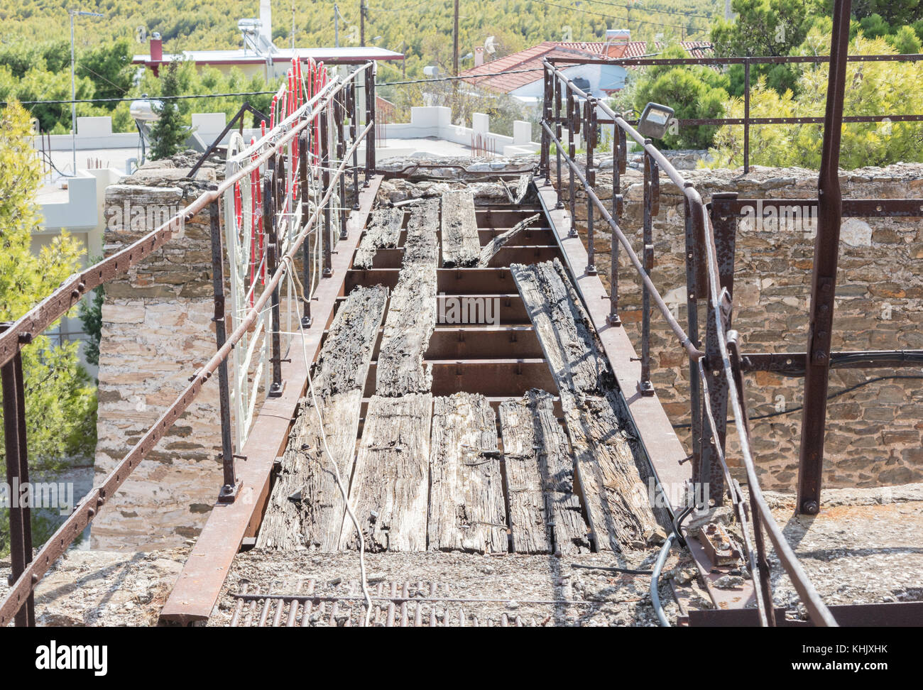 Old broken bridge at a Greek mine Stock Photo - Alamy
