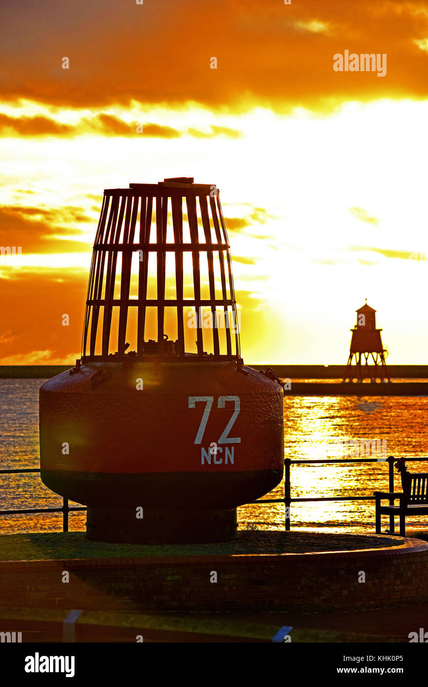 North Shields buoy with South Shields Herd Sands vintage lighthouse on ...