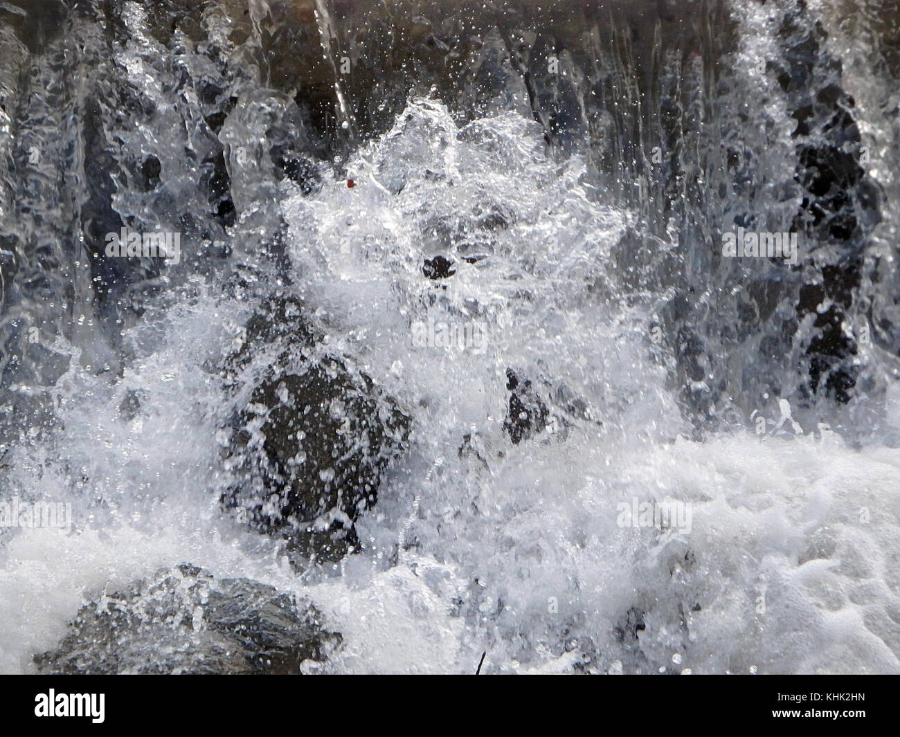 Strong boiling of water under mountain waterfall, Bubbling waterfall ...