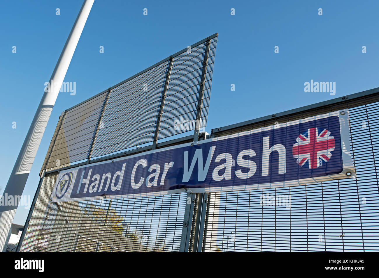 hand car wash sign fixed to railings in east sheen, southwest london ...