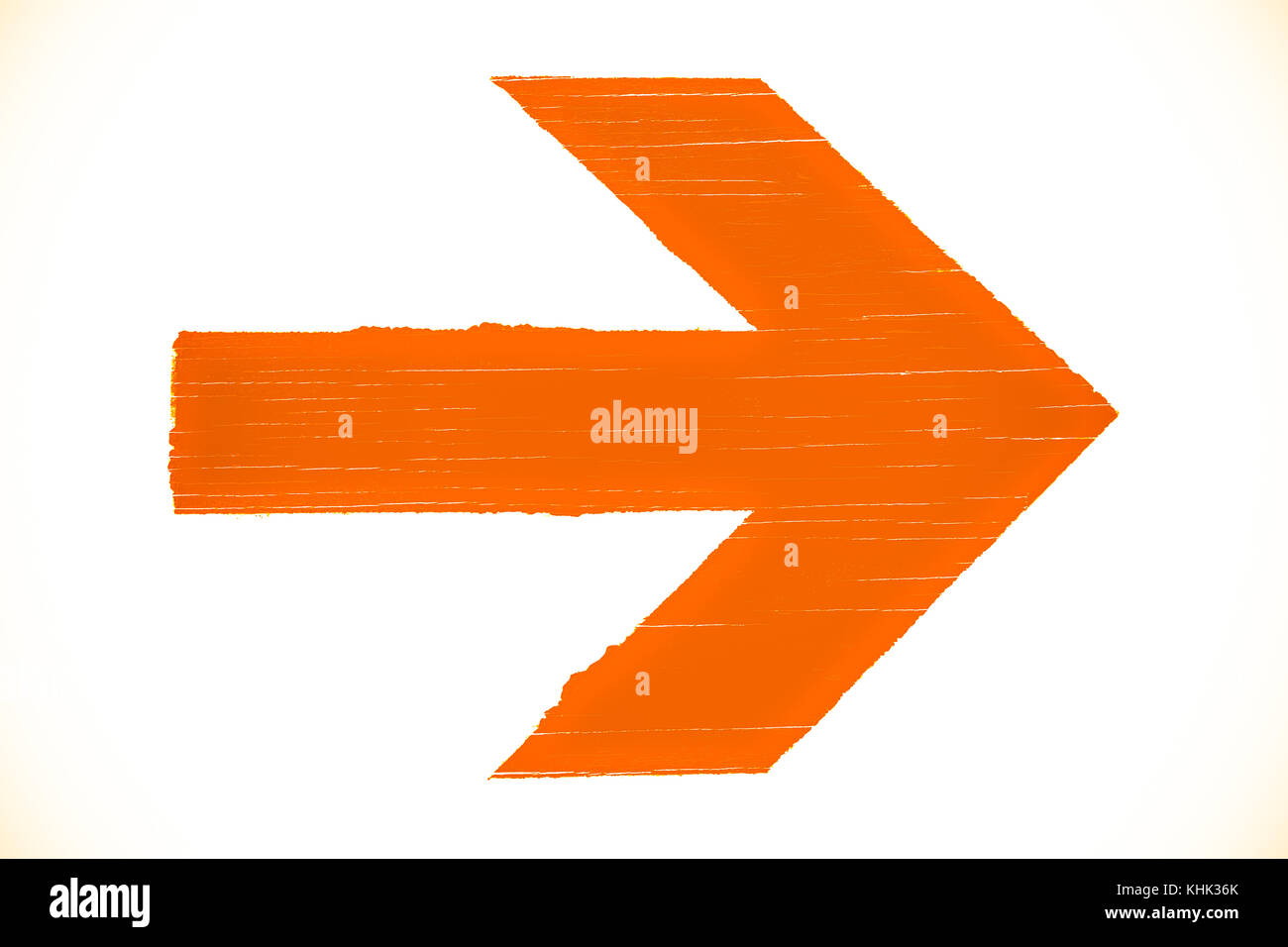 Directional orange arrow manually painted on wooden signboard texture ...