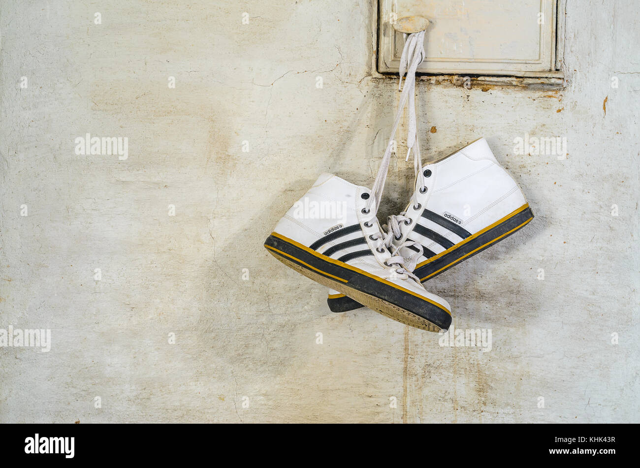 Shoes hang on sign hi-res stock photography and images - Alamy