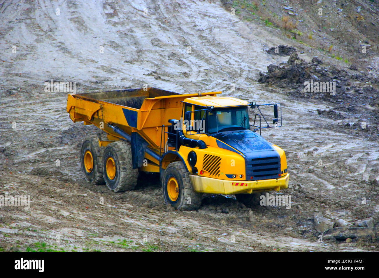 truck works on construction site. Big modern lorry Stock Photo - Alamy