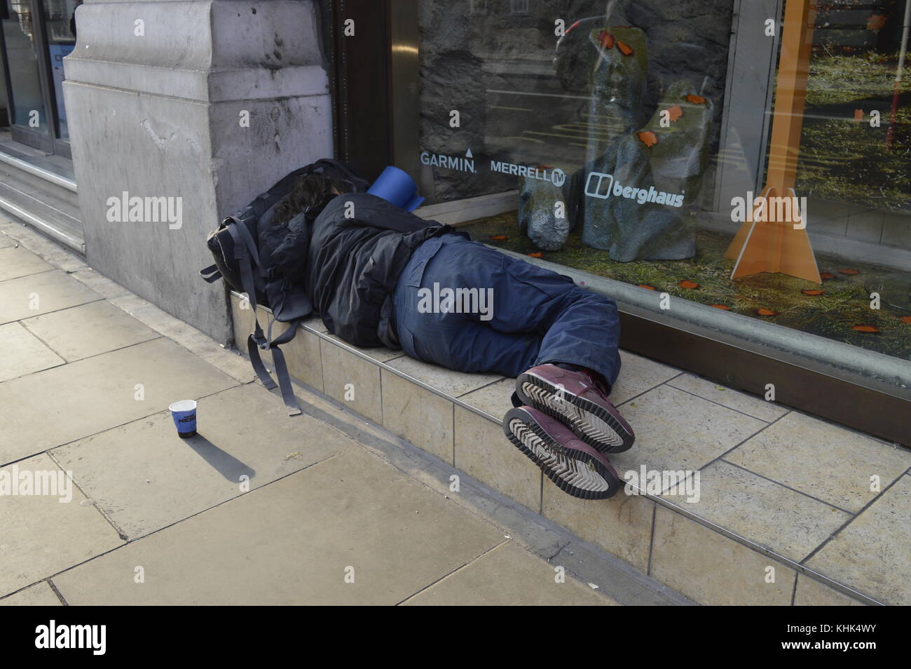 Homeless Man sleeping in a Piccadilly Street, opposite the Ritz Stock ...
