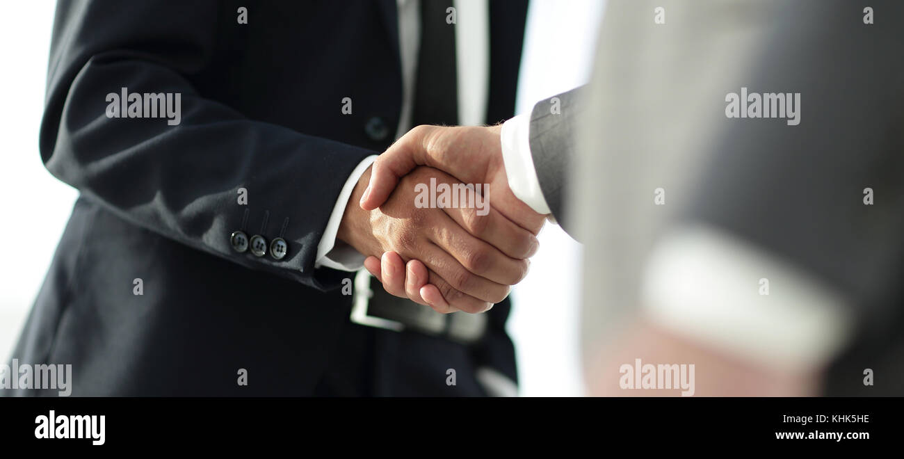 Business men giving a handshake. Business concept Stock Photo - Alamy