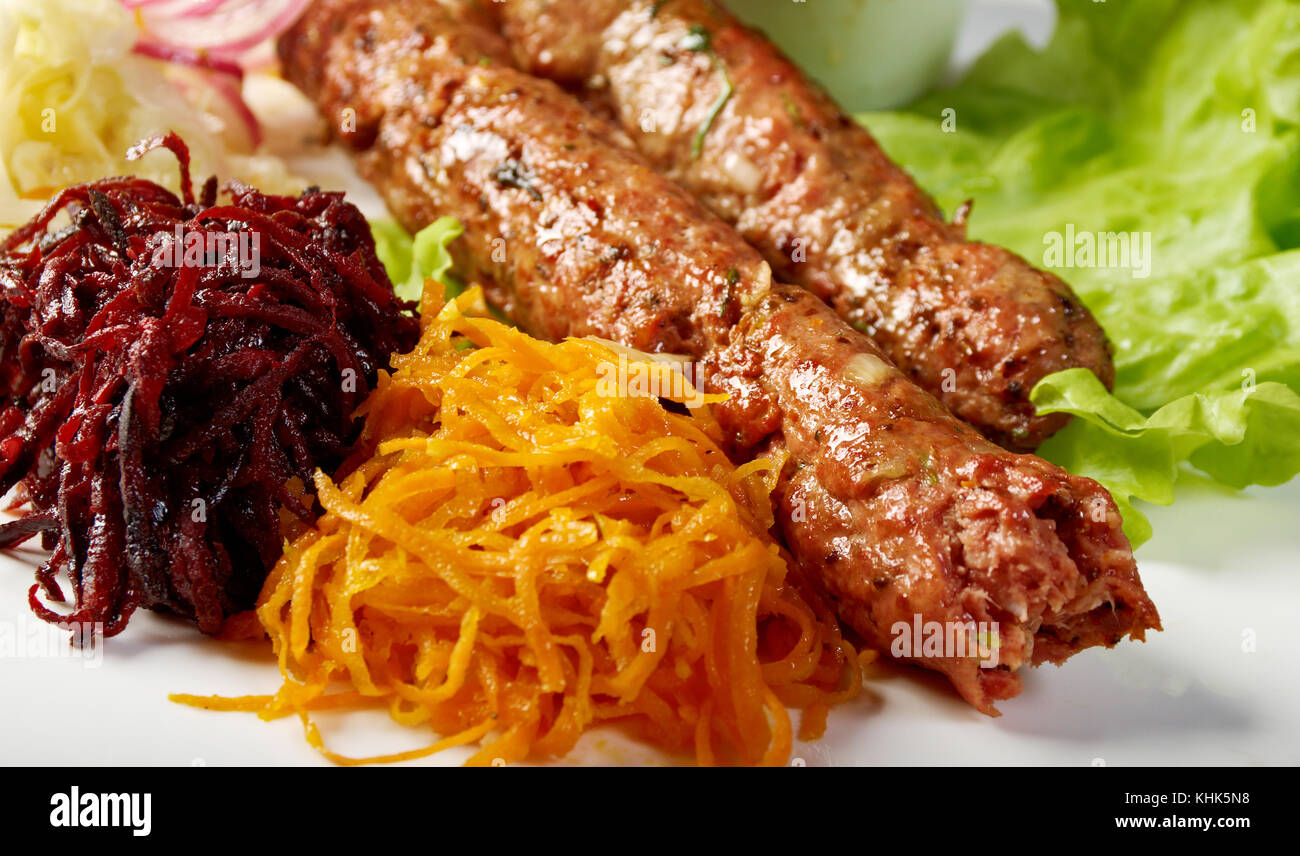 Lebanese Kebab with vegetable, close up. Arabian cuisine Stock Photo ...