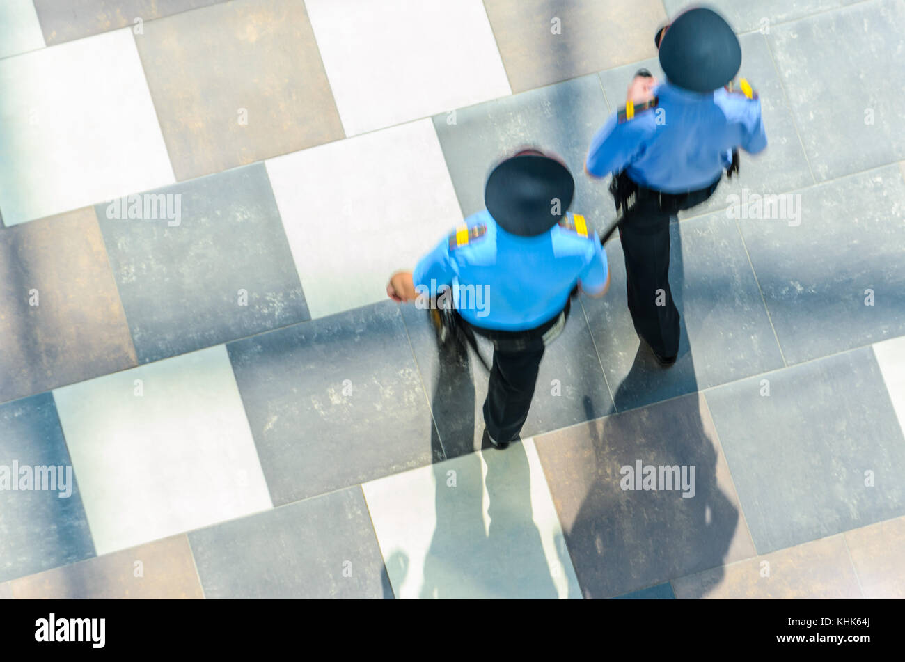Two Policemen Patrolling the Area, Top View. Silhouettes of Two Police ...