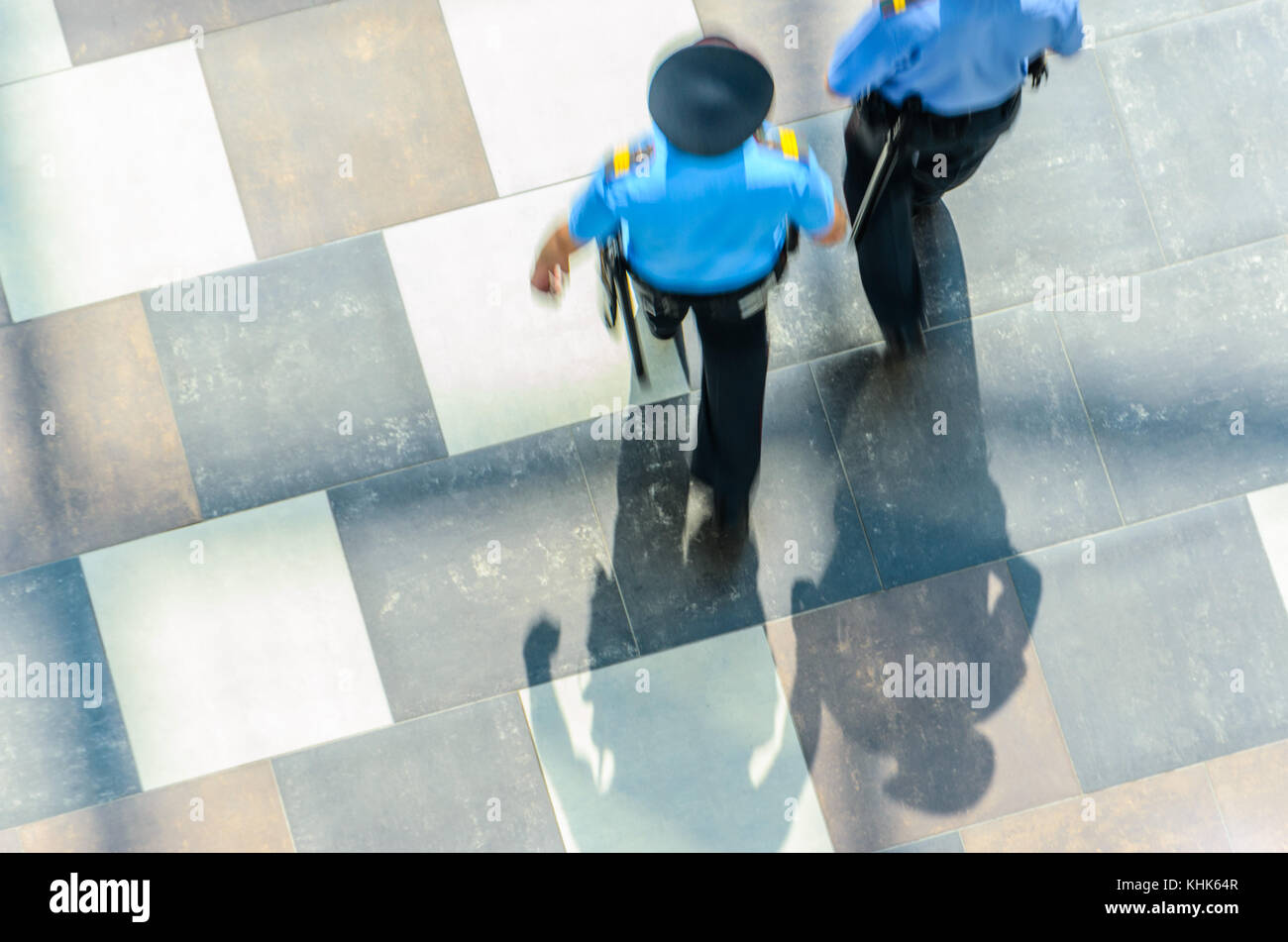 Two Policemen Patrolling the Area, Top View. Silhouettes of Two Police ...