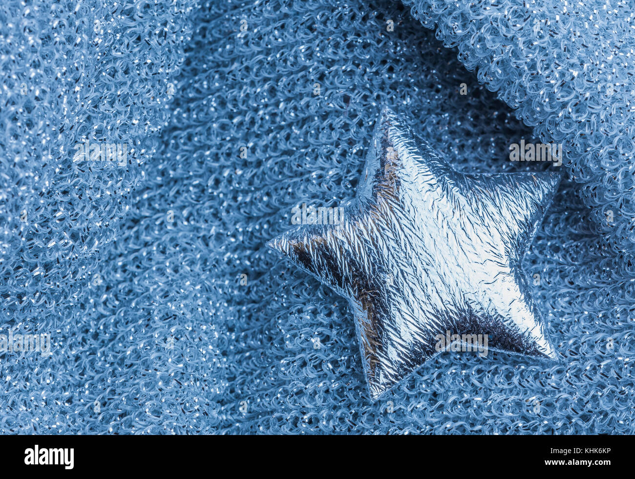 Shiny silver star on gray texture cloth Stock Photo - Alamy