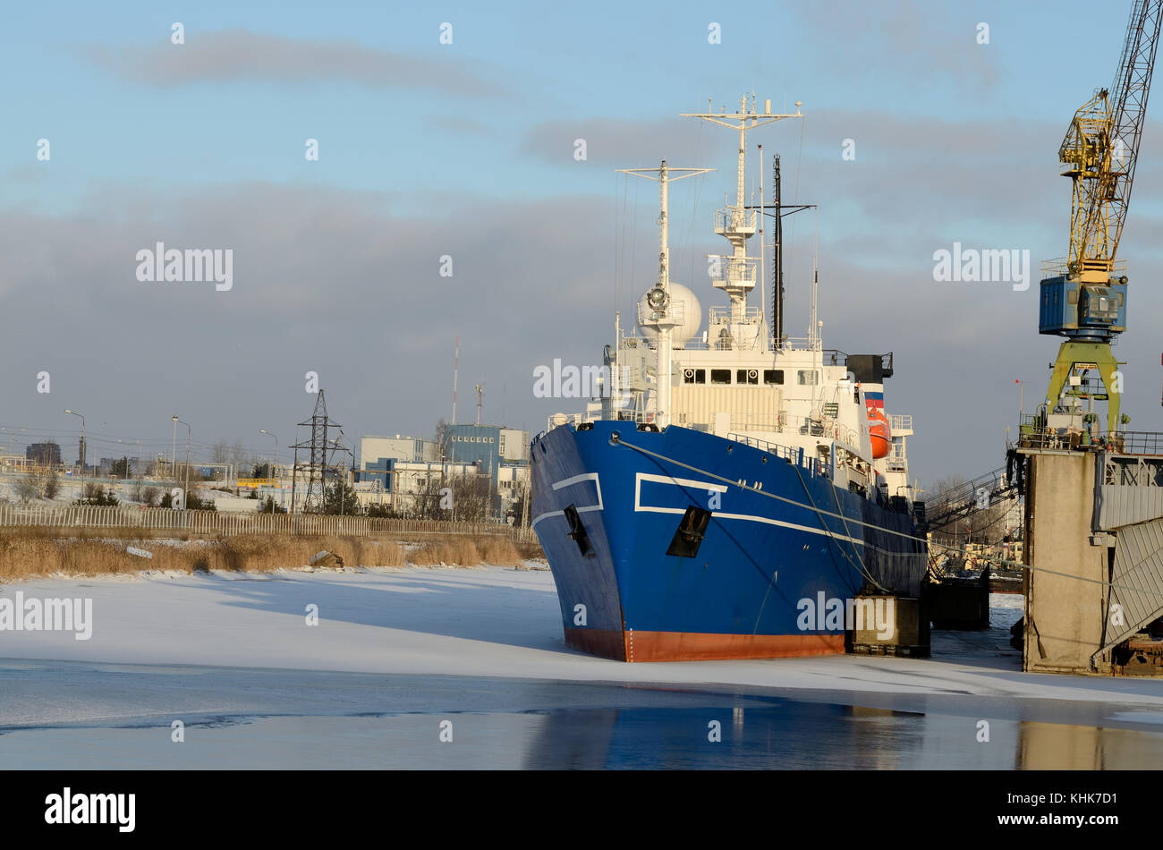 The cargo ship is in port and loading goods Stock Photo - Alamy