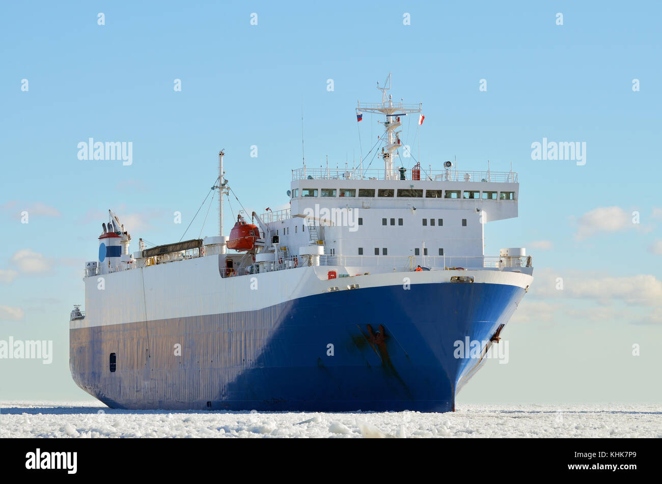 A beautiful winter landscape.A huge tanker sailing on the sea Stock ...