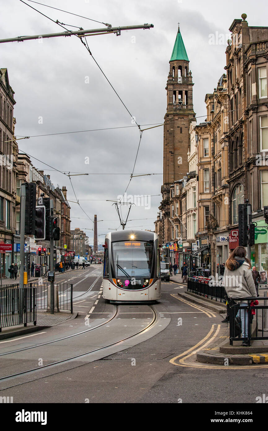 A tram line, tram, buses on Princess street of Edinburgh, Scotland ...