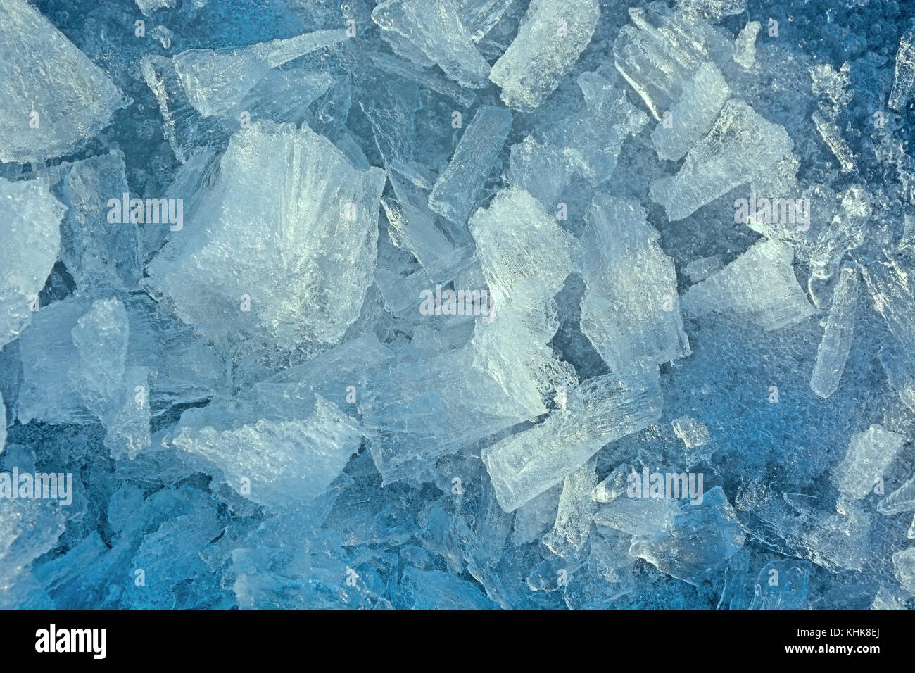 Fragmented and cracked ice at sunset as a background Stock Photo - Alamy