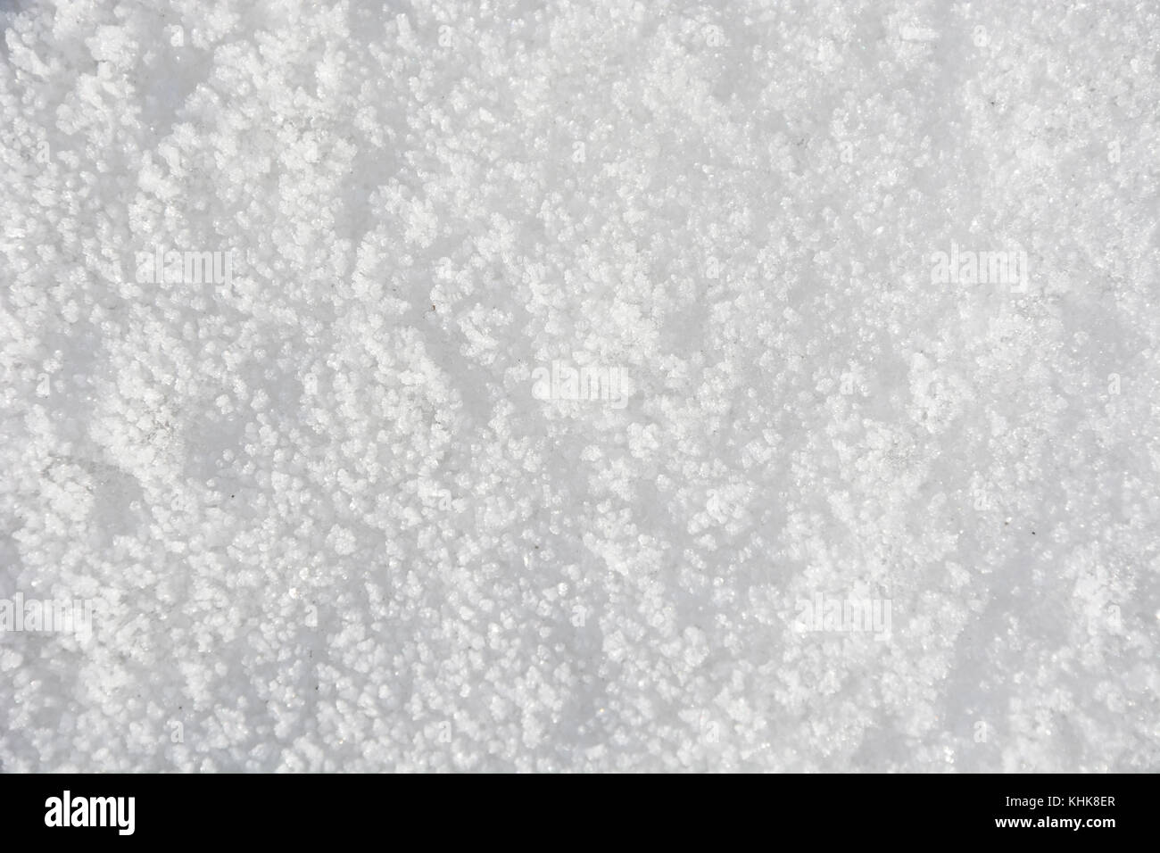 Snow surface at sunny day, winter wallpaper Stock Photo - Alamy