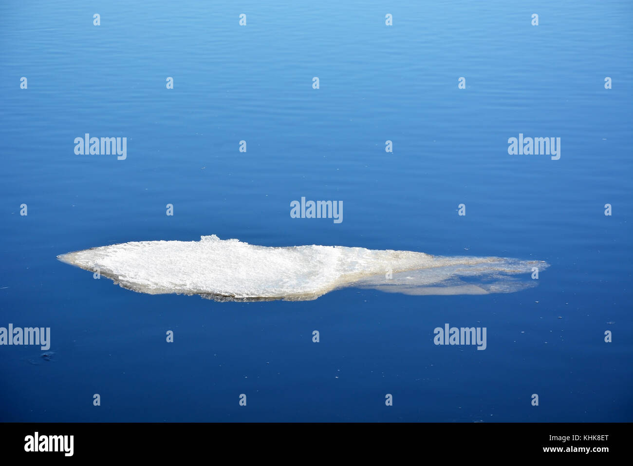 Water background with ice floating. Blue water, spring season Stock ...