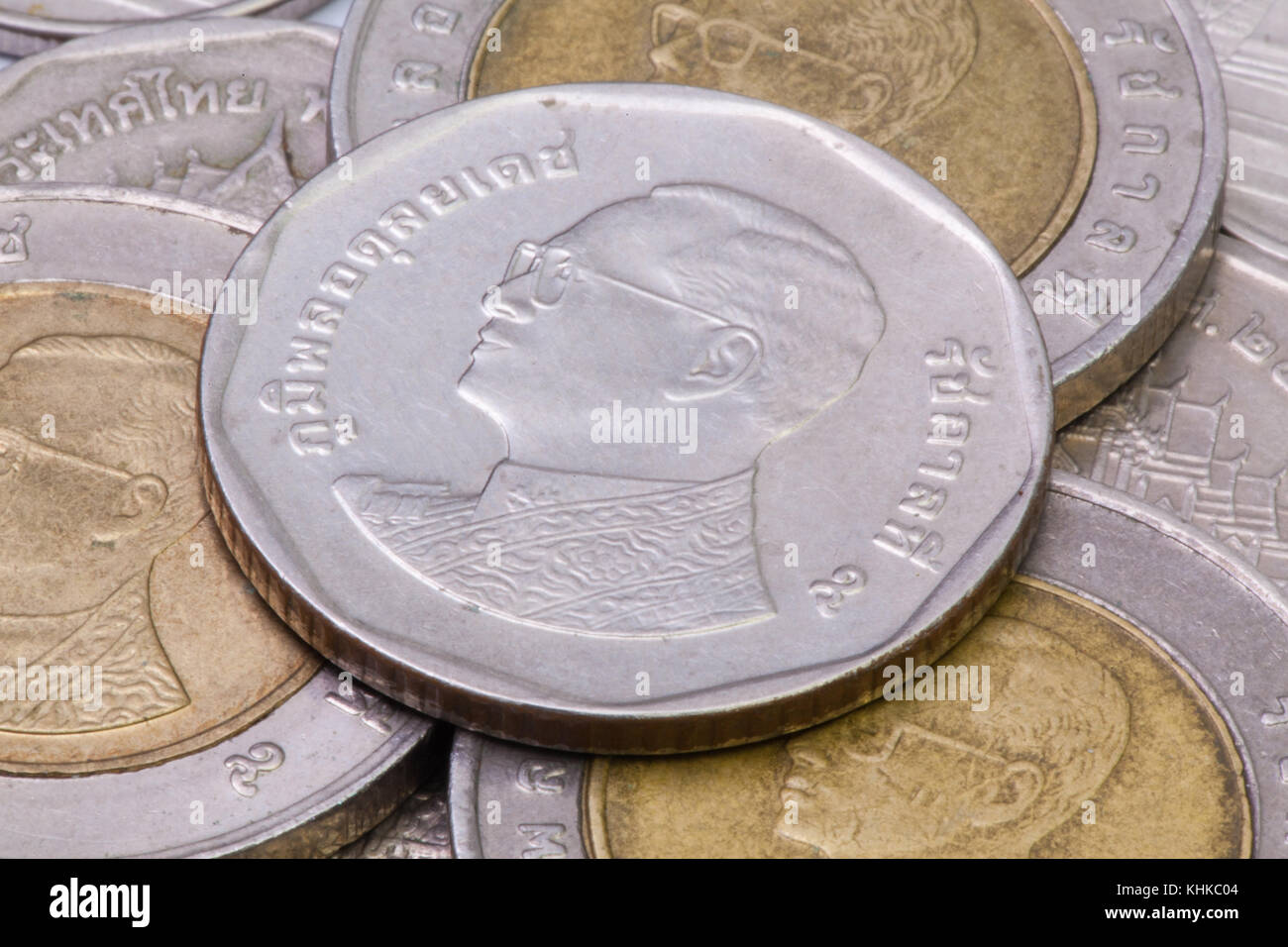 Detail of different Thai coins on the table Stock Photo - Alamy