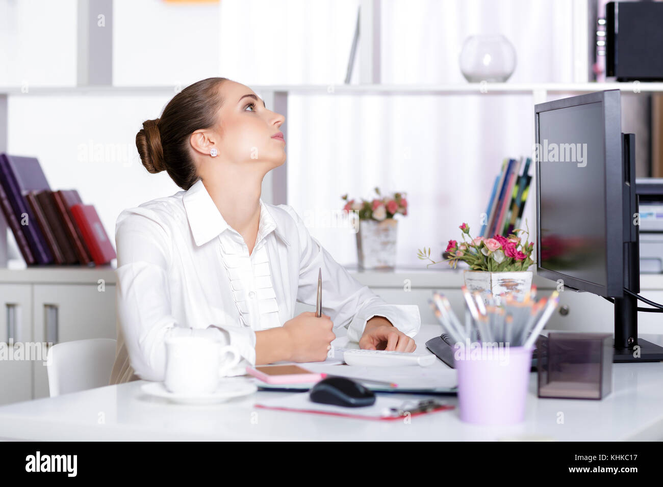 tired woman manager in the office Stock Photo - Alamy