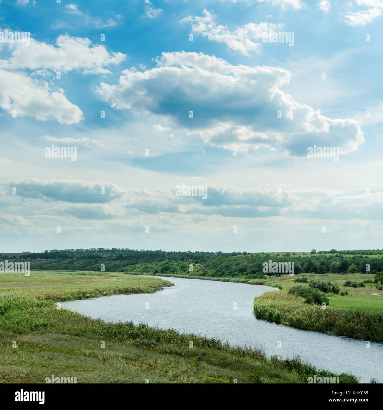 dramatic clouds over river Stock Photo - Alamy