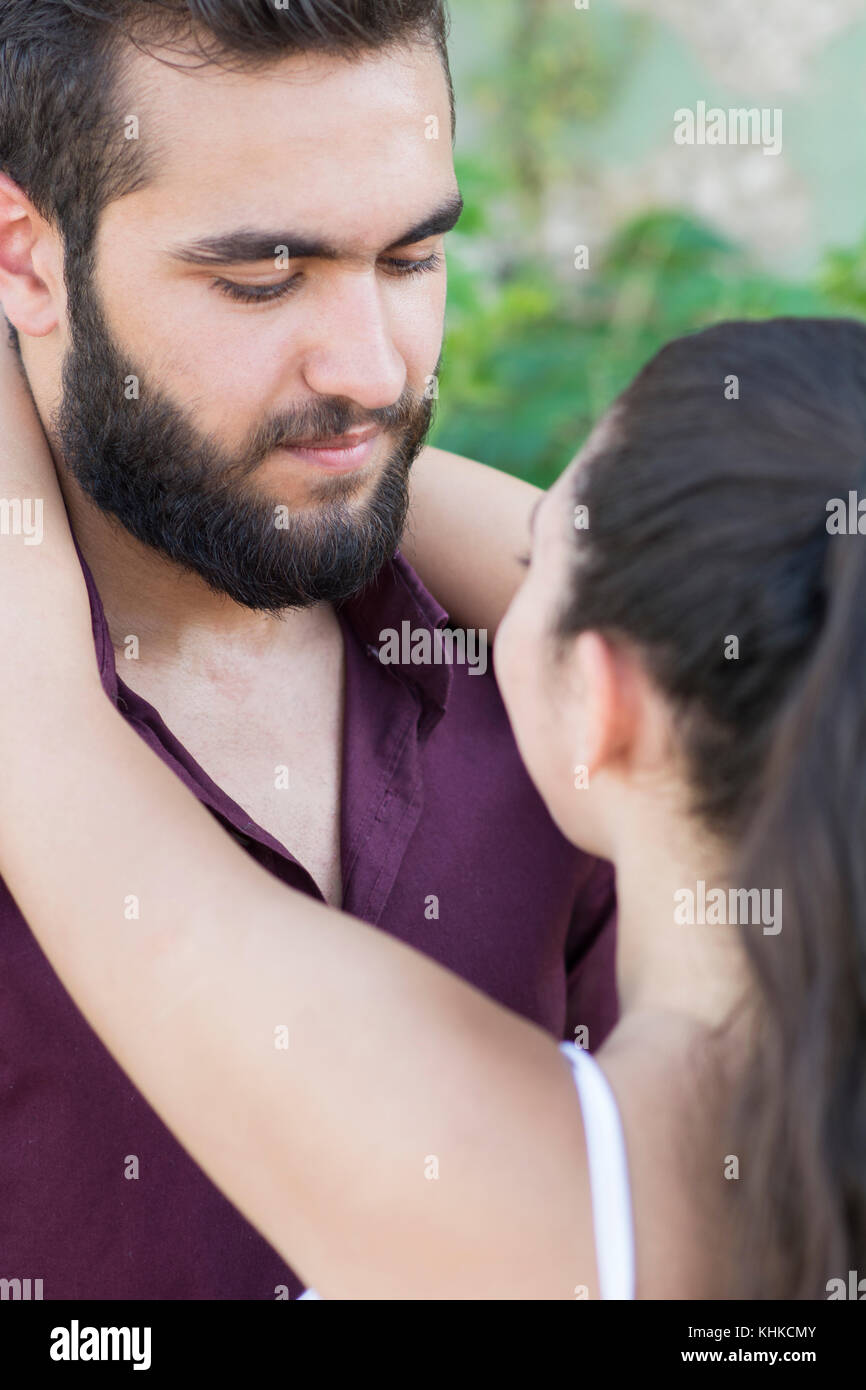 Young Middle Eastern couple hugging outdoors Stock Photo - Alamy
