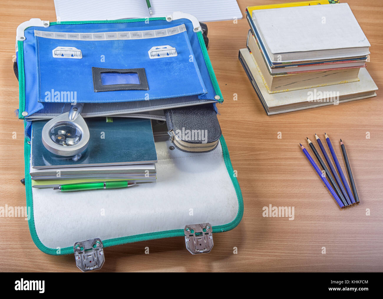 School bag with books, notebooks, pen and pencils Stock Photo - Alamy