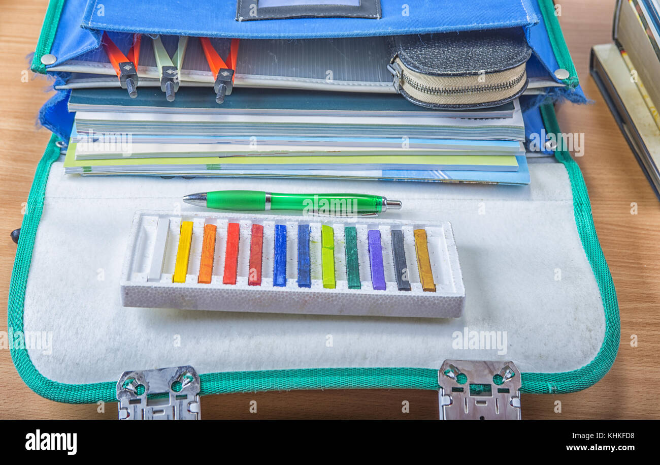 School bag with books, notebooks, pen and pencils Stock Photo - Alamy