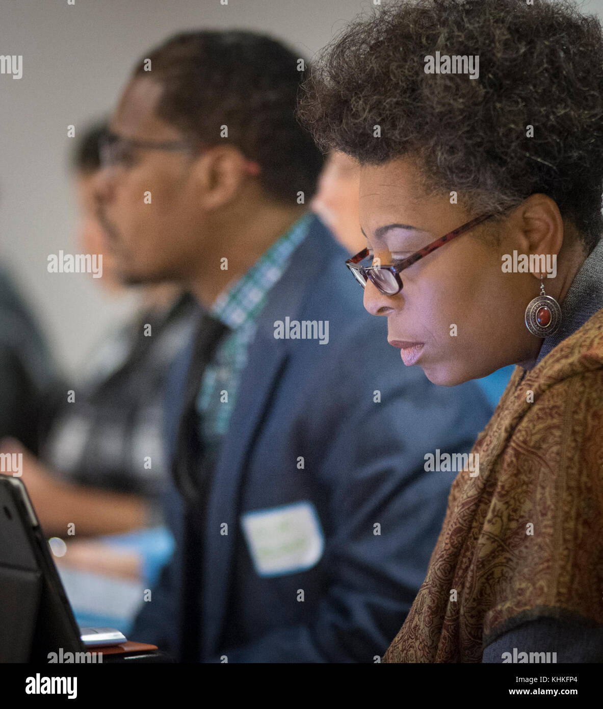An audience member takes note of U.S. Department of Agriculture (USDA ...