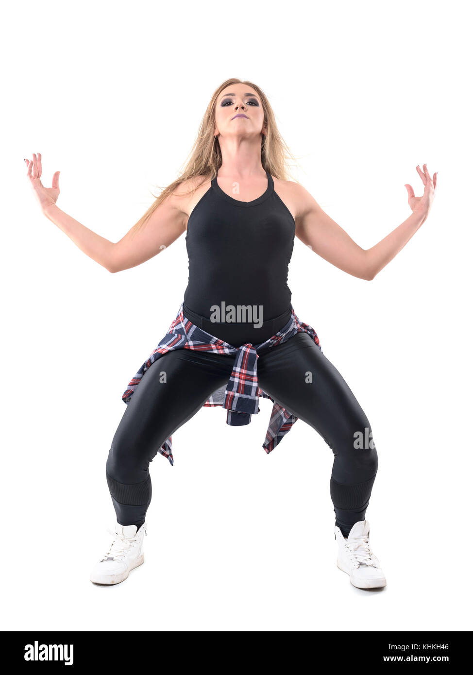 Woman jazz dancer performer posture with arms raised and head back ...