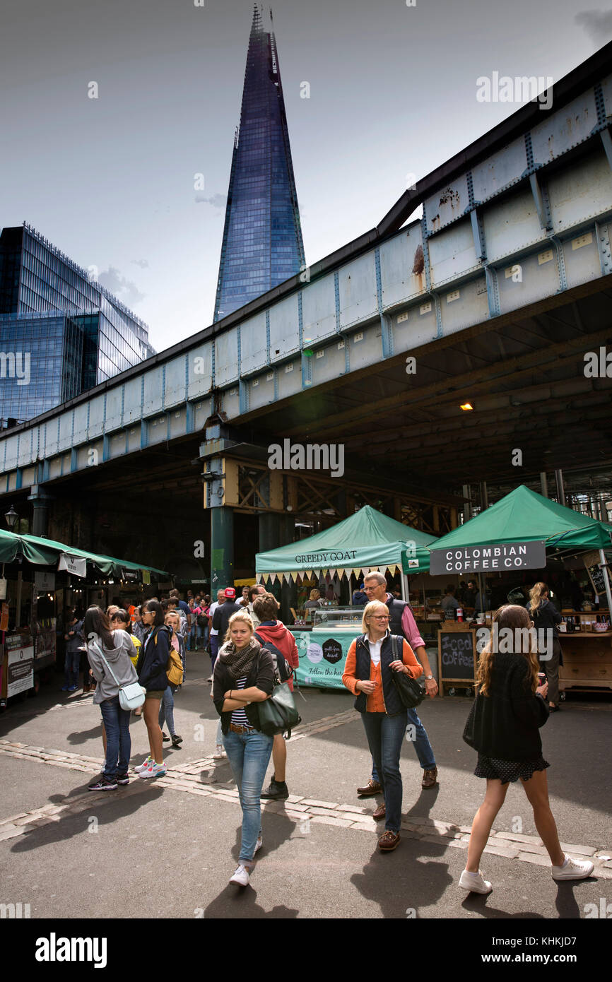 UK, London, Southwark, Borough Market, early morning visitors in ...