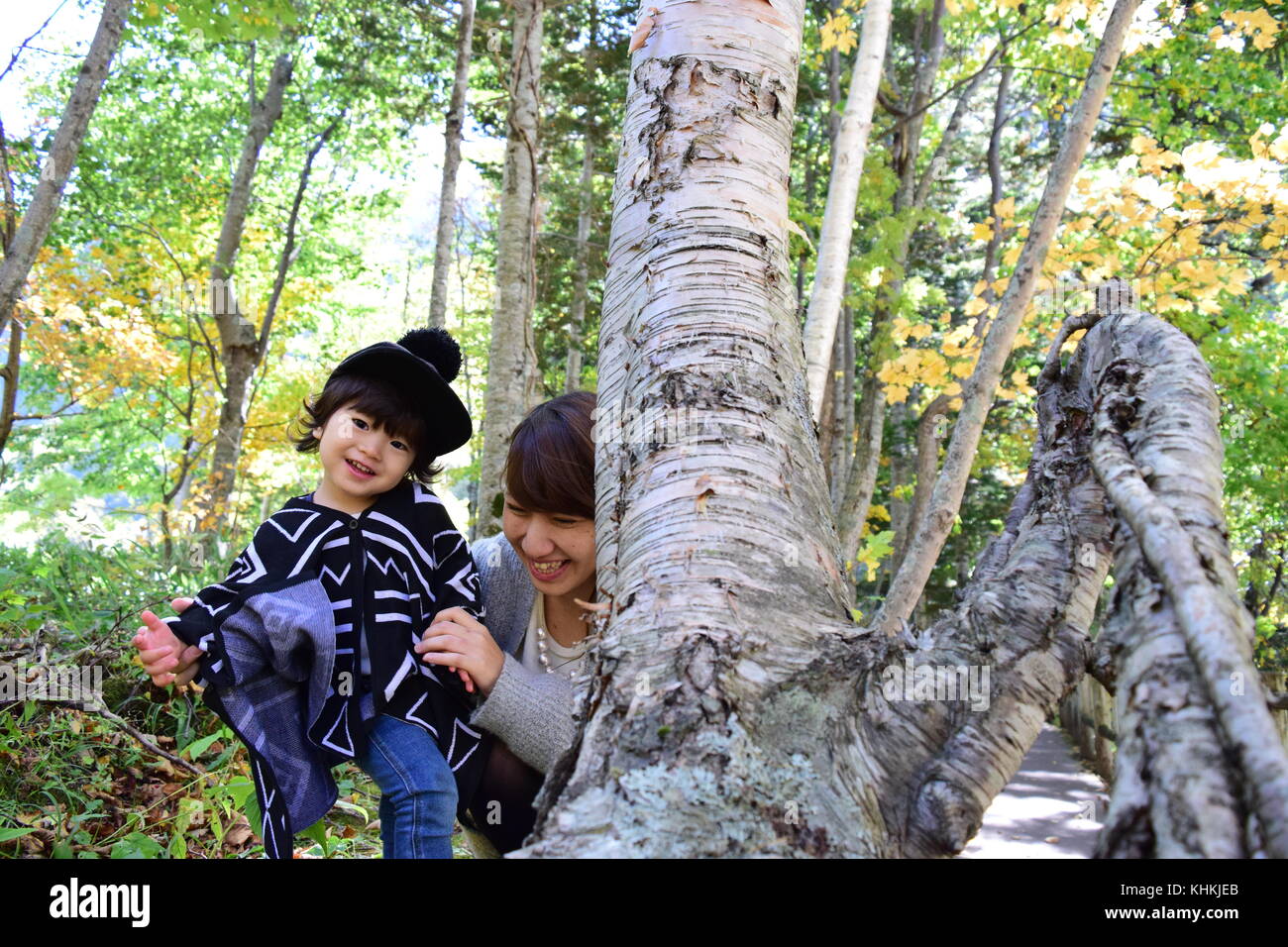 young japanese mother is playing with her son at outer place Stock Photo - Alamy