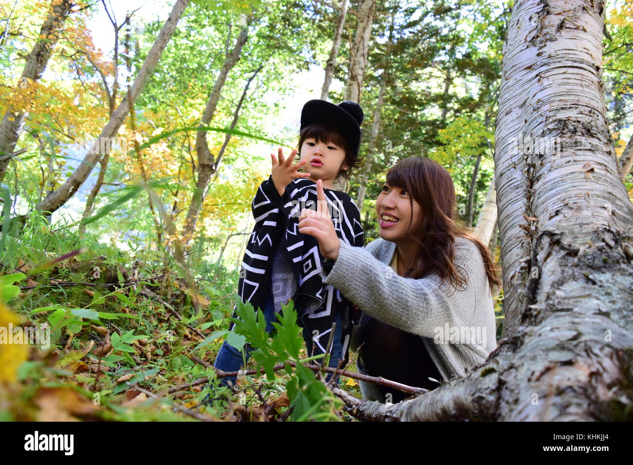 young japanese mother is playing with her son at outer place Stock Photo - Alamy