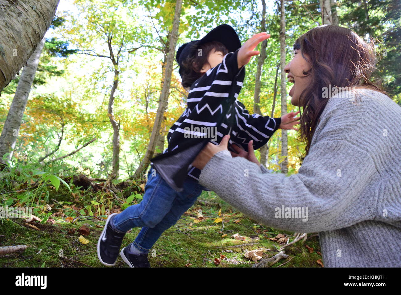 young japanese mother is playing with her son at outer place Stock Photo - Alamy