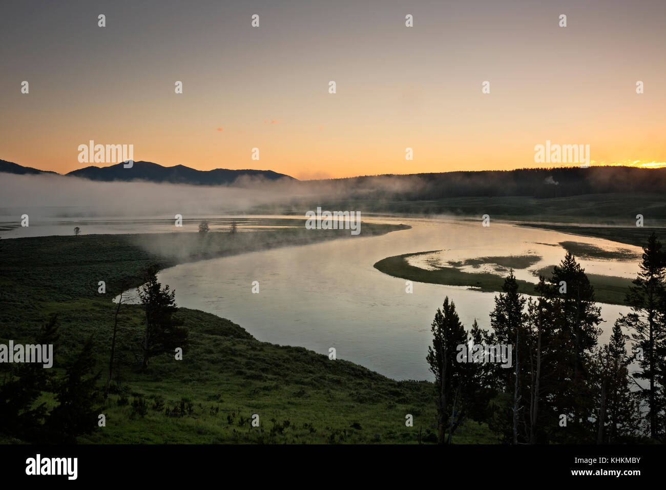 WY02623-00...WYOMING - Sunrise over the Yellowstone River in the Hayden ...