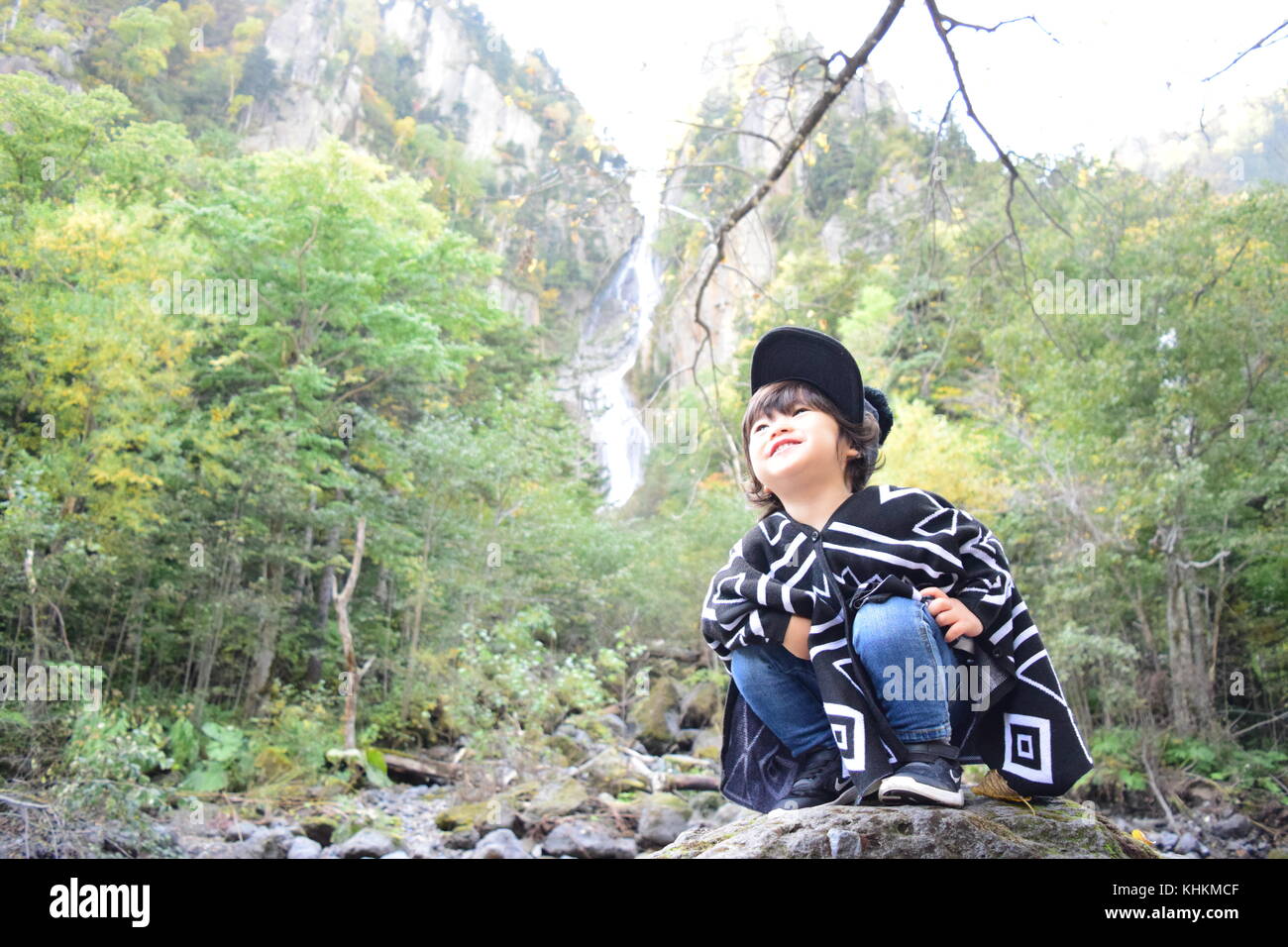 young japanese son is playing with mother at outer place Stock Photo - Alamy