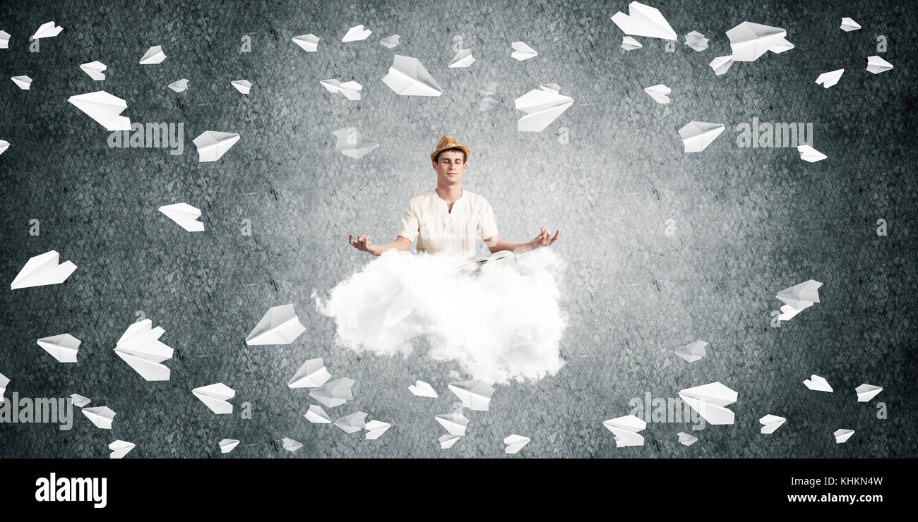 Young man keeping mind conscious Stock Photo - Alamy